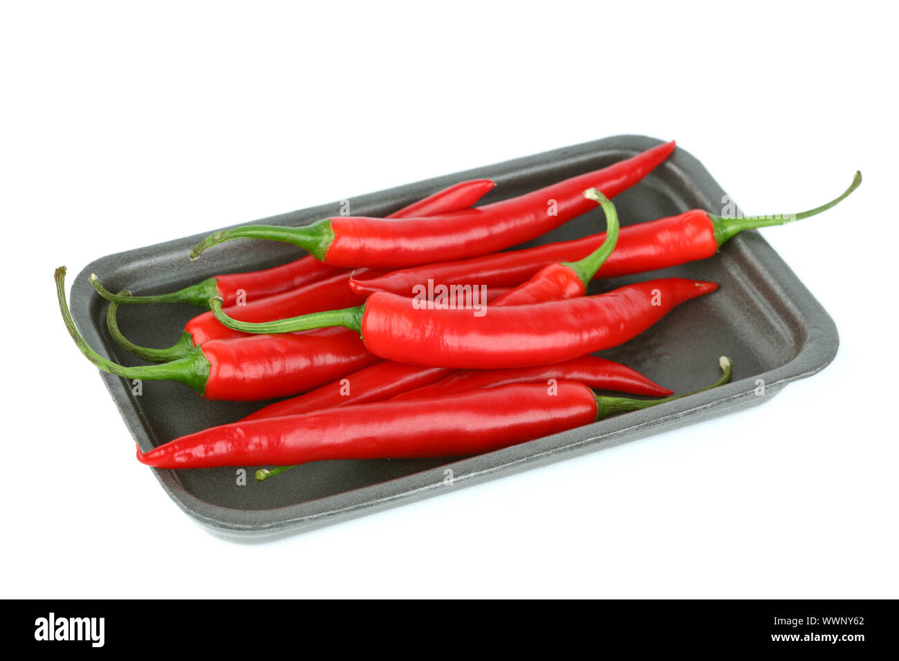 chilli pepper pack isolated on white background Stock Photo - Alamy