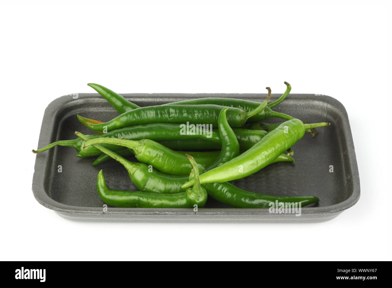 chilli pepper pack isolated on white background Stock Photo - Alamy