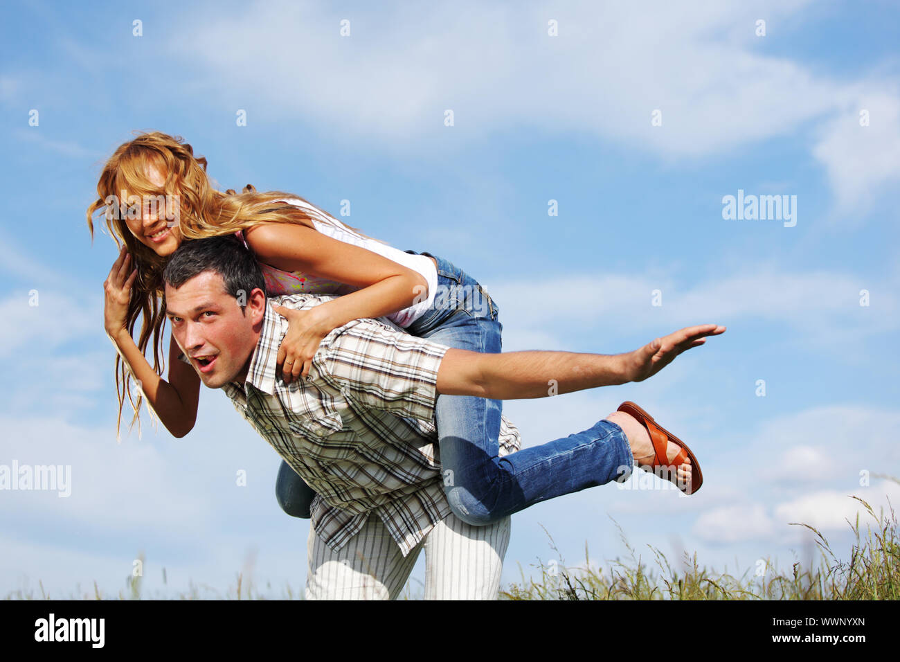 man and woman hug in the sky Stock Photo - Alamy