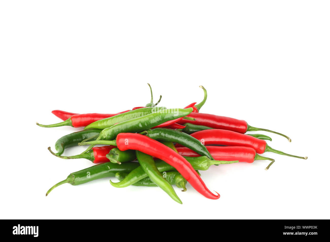 mixed chilli pile isolated on white Stock Photo - Alamy