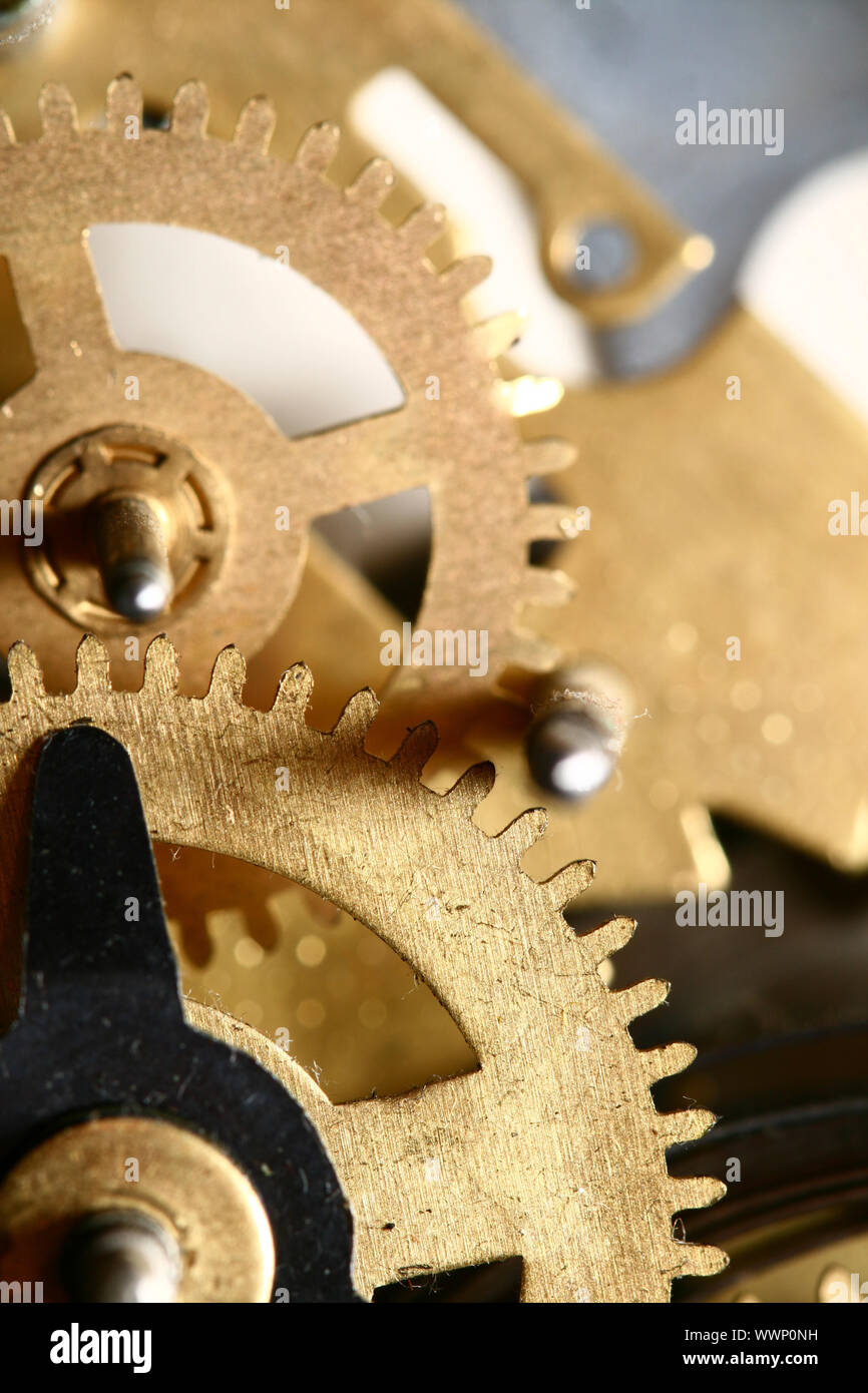 time gear inside my rare clock Stock Photo - Alamy