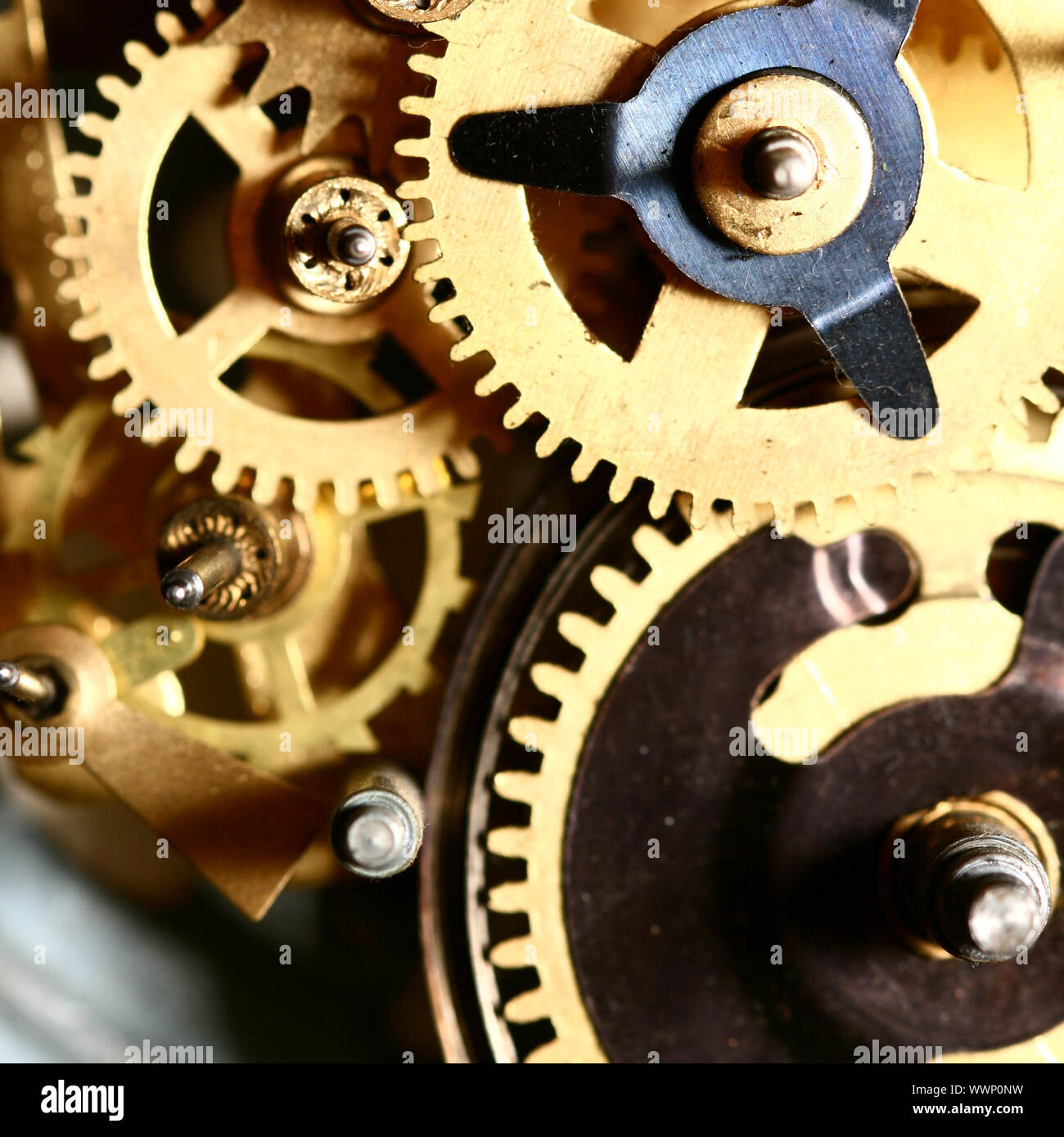 time gear inside my rare clock Stock Photo - Alamy