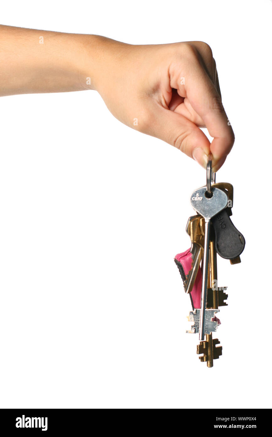 girl hand take key in fingers Stock Photo - Alamy