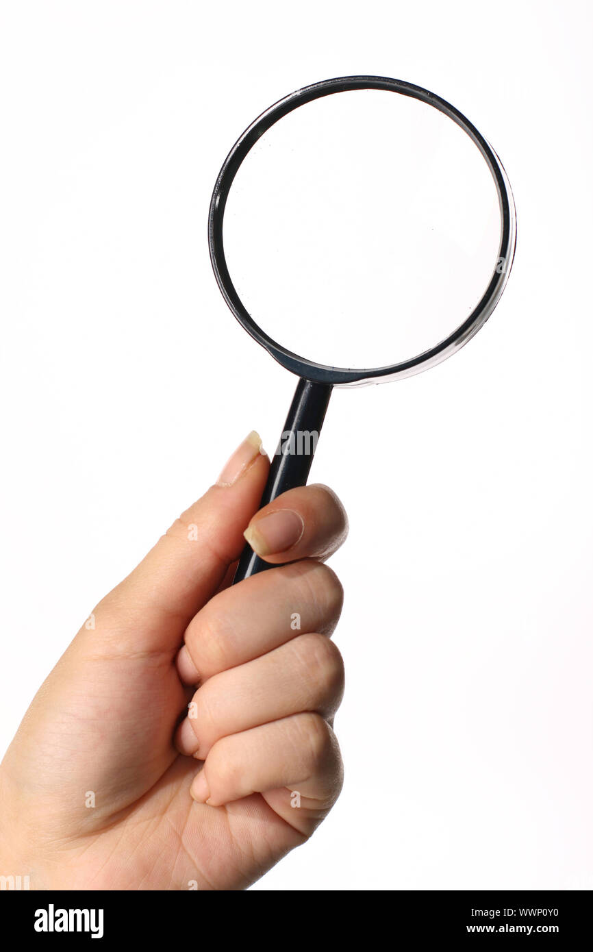 research magnifier hand take in fingers Stock Photo - Alamy