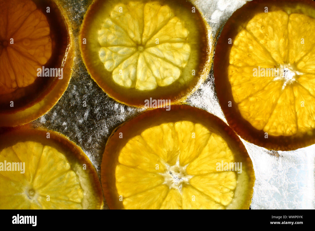 orange in ice cube frozen background Stock Photo - Alamy