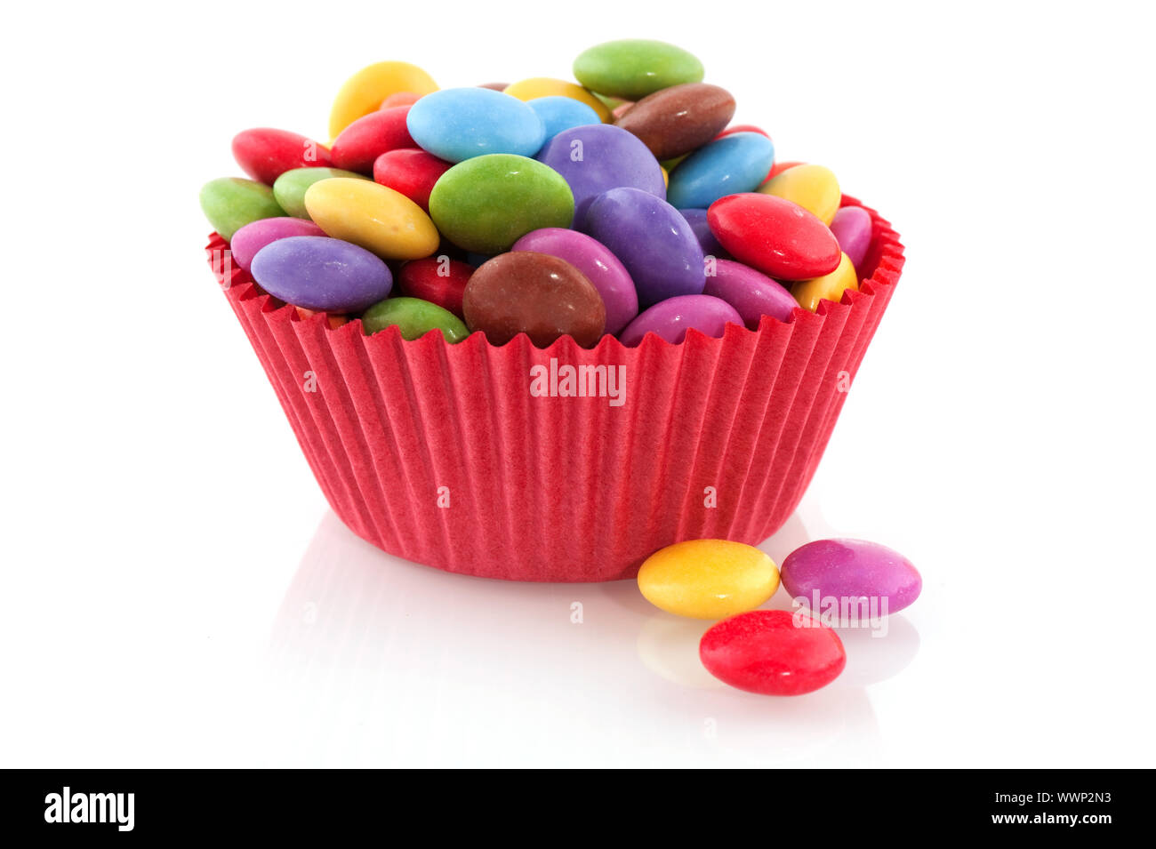 colorful tiny sweets in red paper cup Stock Photo - Alamy
