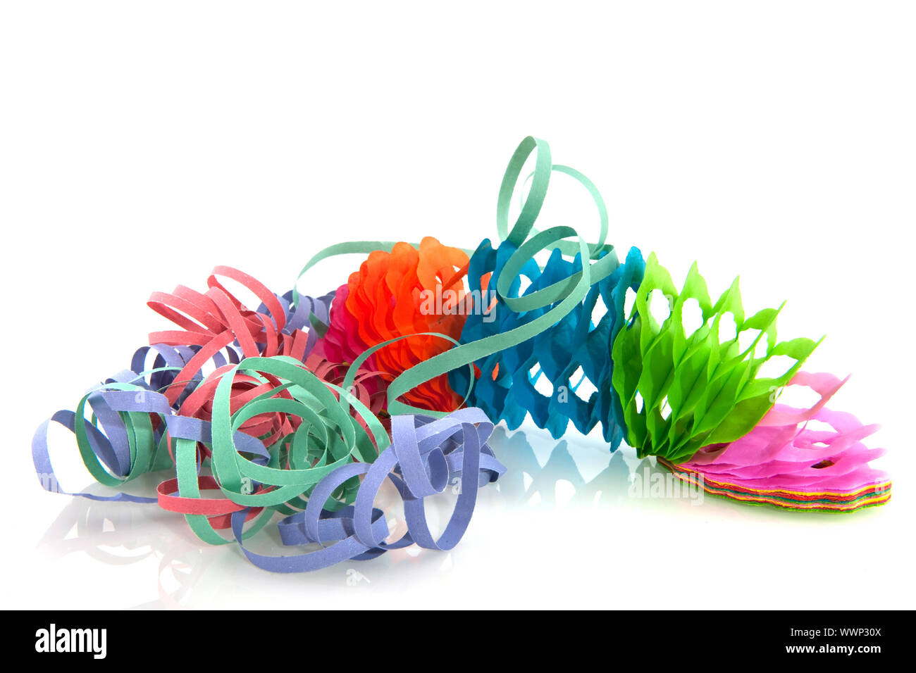 colorful paper garland and party streamers on white background Stock ...