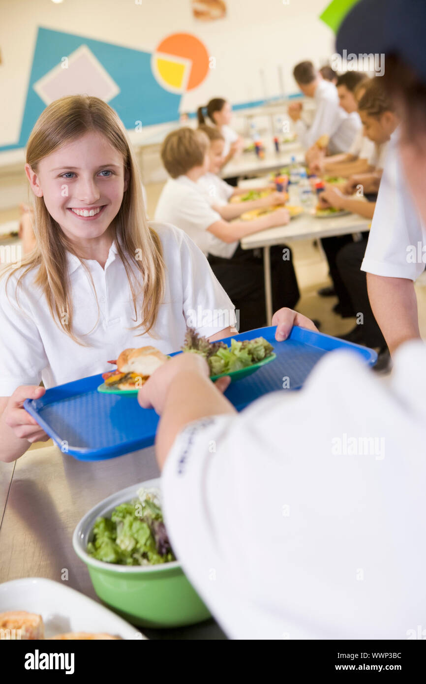 Student having lunch in dining hall Stock Photo - Alamy