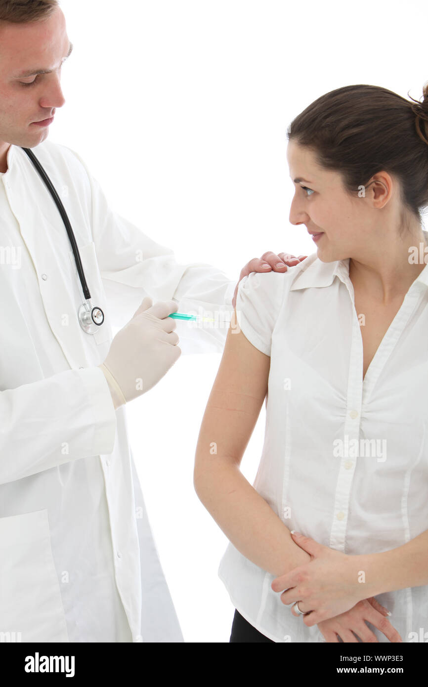 Doctor administering injection arm patient hi-res stock photography and ...