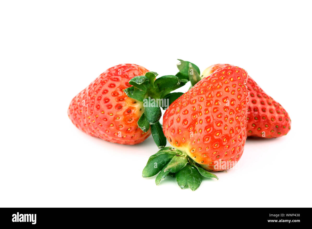 strawberry pile on white background Stock Photo - Alamy