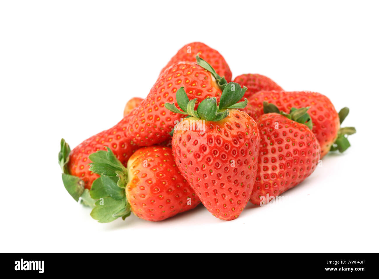 strawberry pile on white background Stock Photo - Alamy