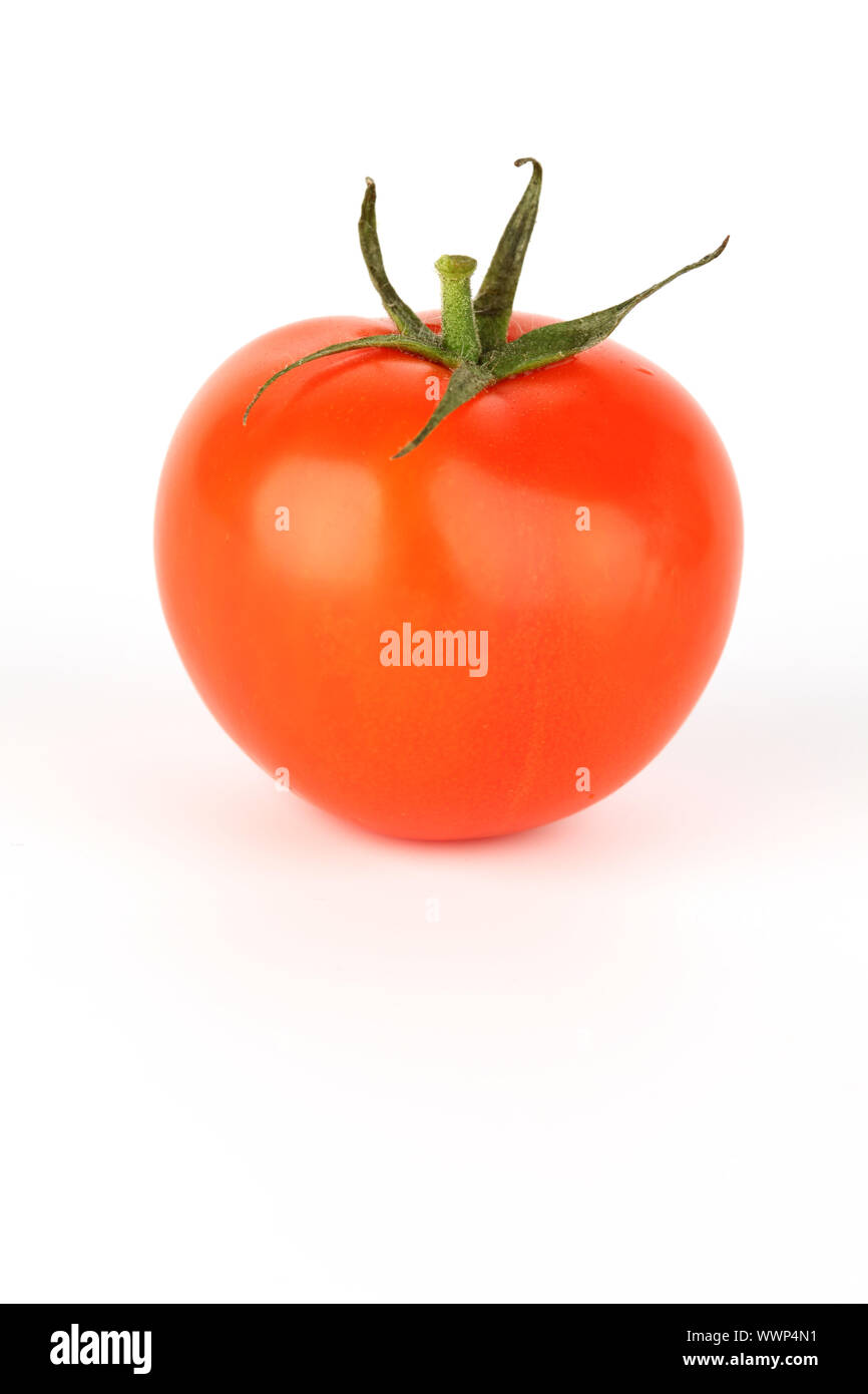 one tomato isolated on white background Stock Photo - Alamy