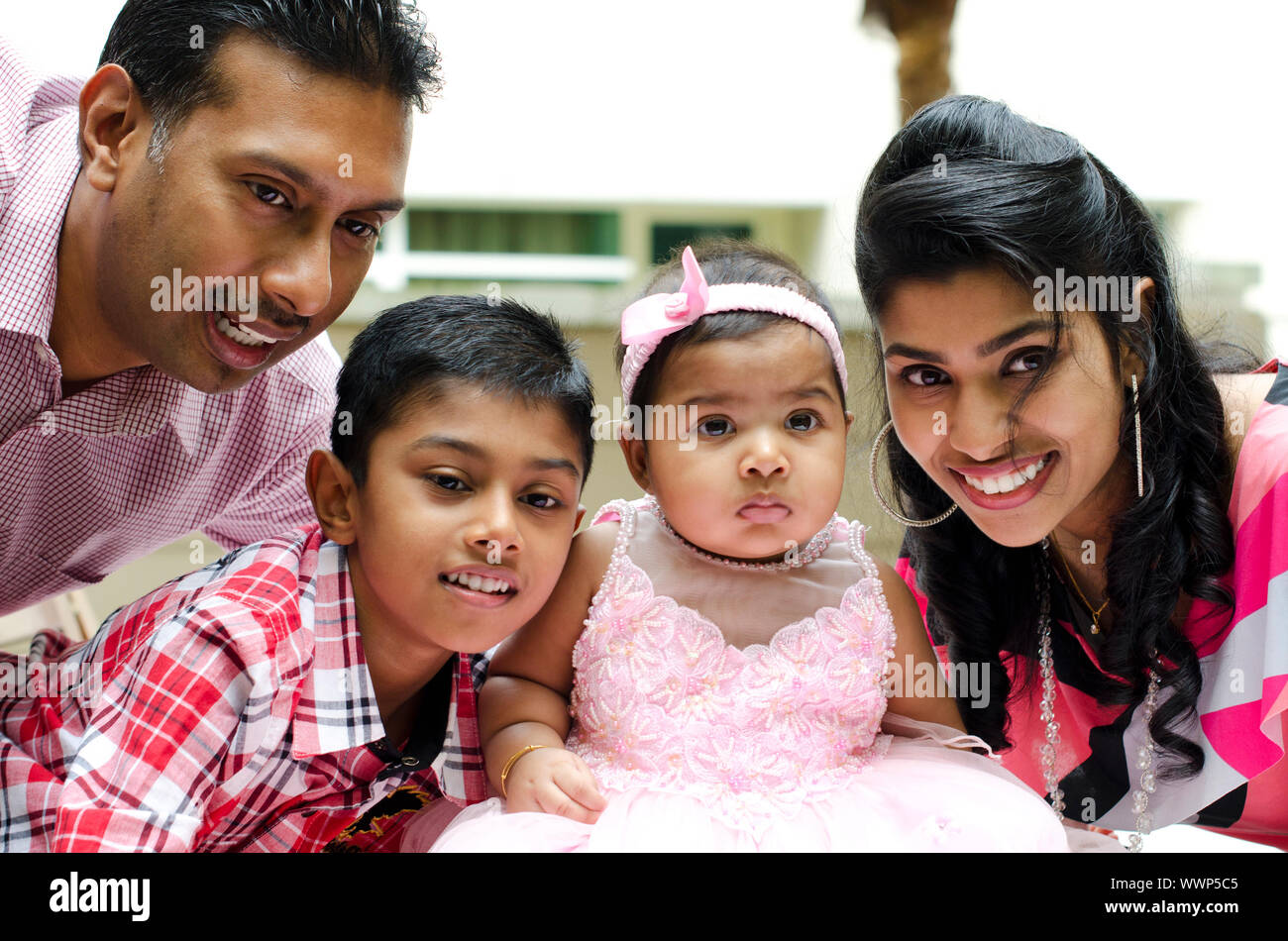 Happy Indian family having fun time at outdoor Stock Photo - Alamy