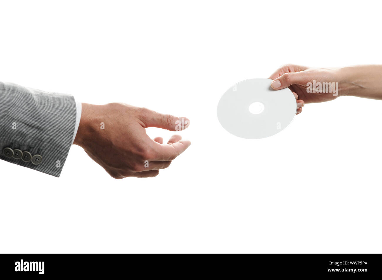Female hand holding a blank disc, white background Stock Photo - Alamy