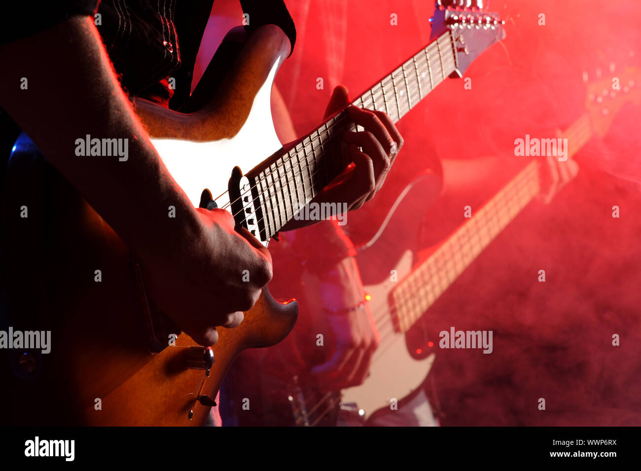 rock musicians playing at a live concert Stock Photo - Alamy