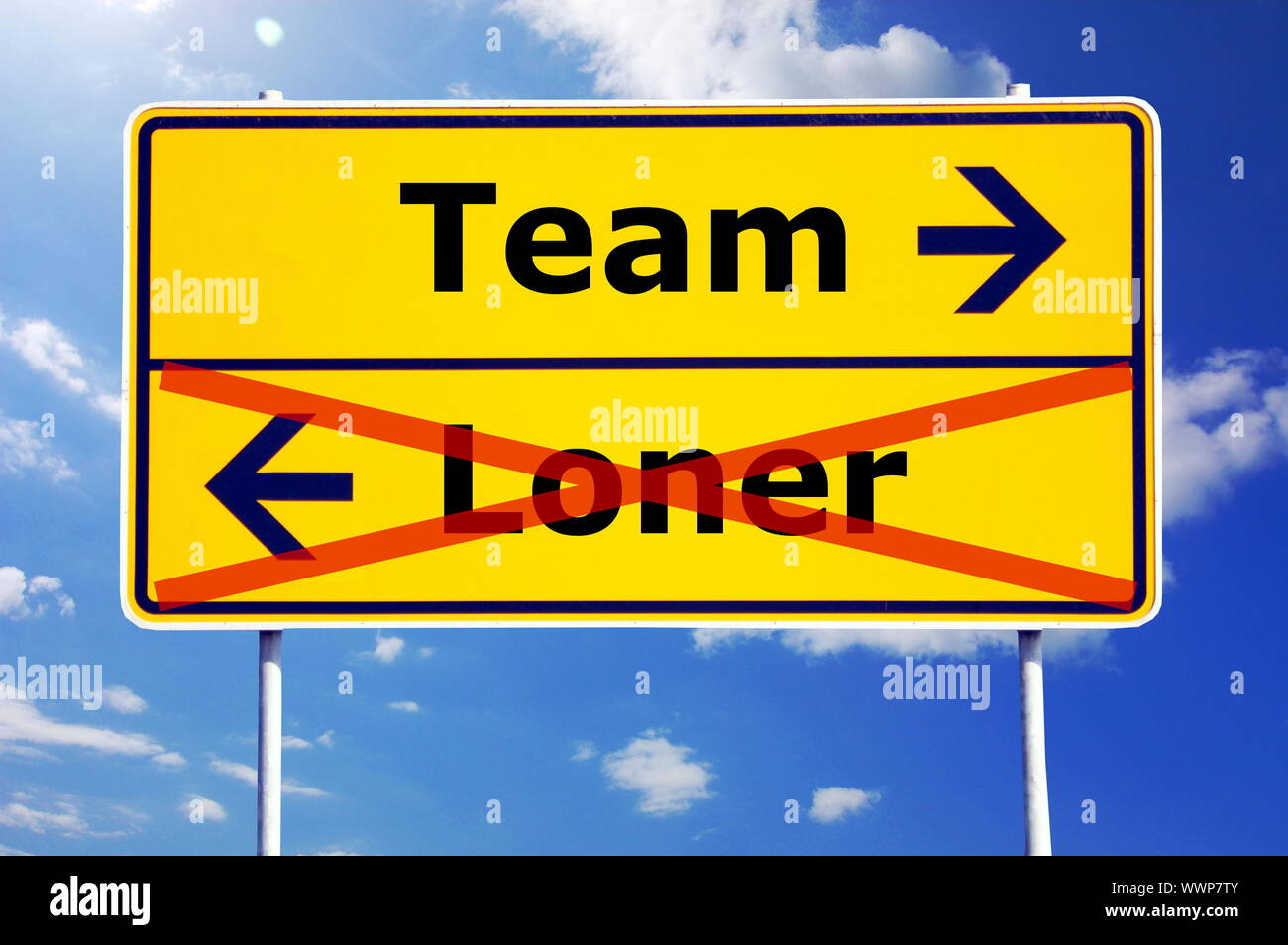 business teamwork concept with yellow road sign Stock Photo - Alamy