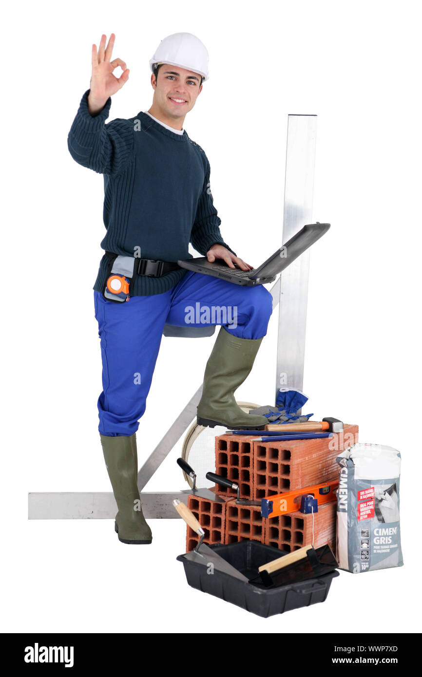 portrait of bricklayer making okay sign Stock Photo - Alamy