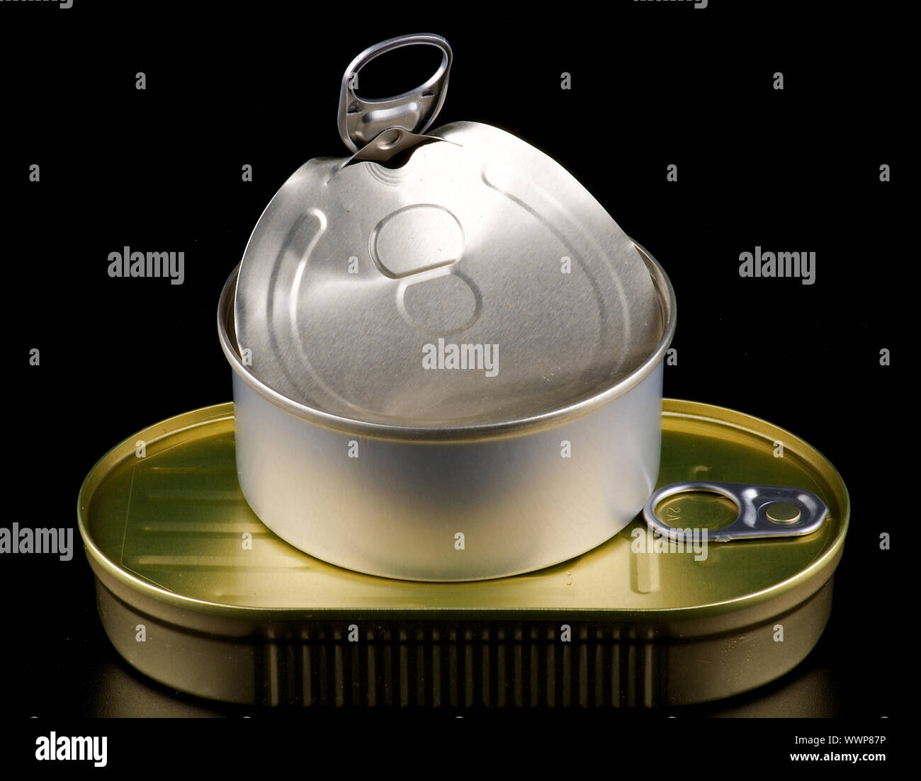 Stack of Canned Goods isolated on black background Stock Photo - Alamy