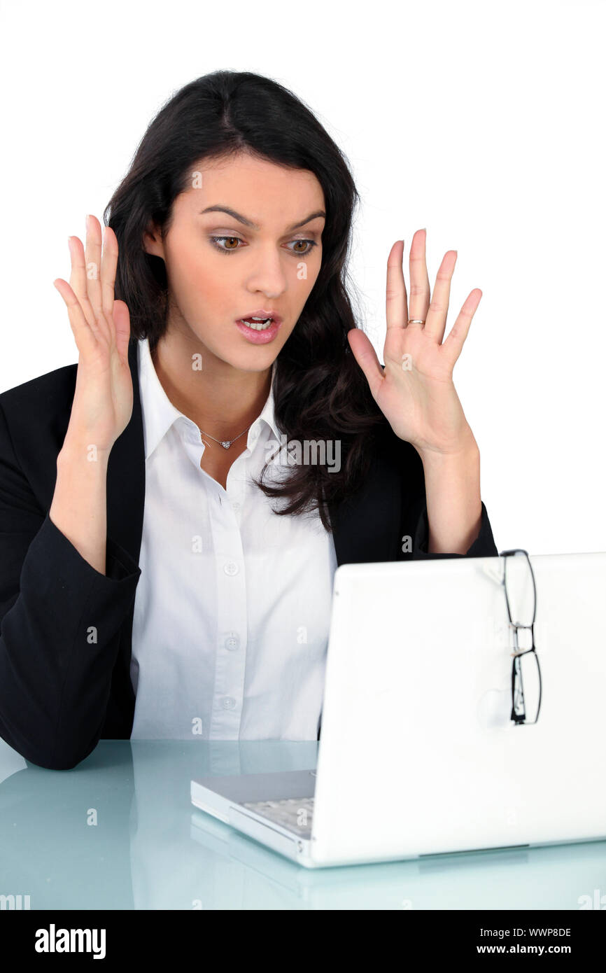 Woman having problem with computer Stock Photo - Alamy