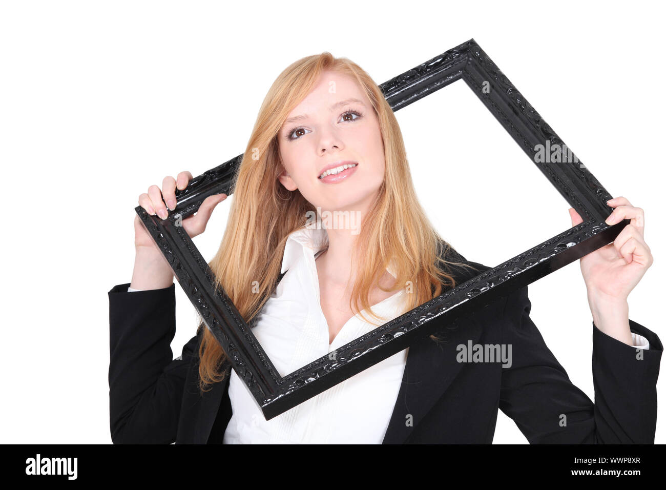 Girl passing her head through a frame Stock Photo - Alamy