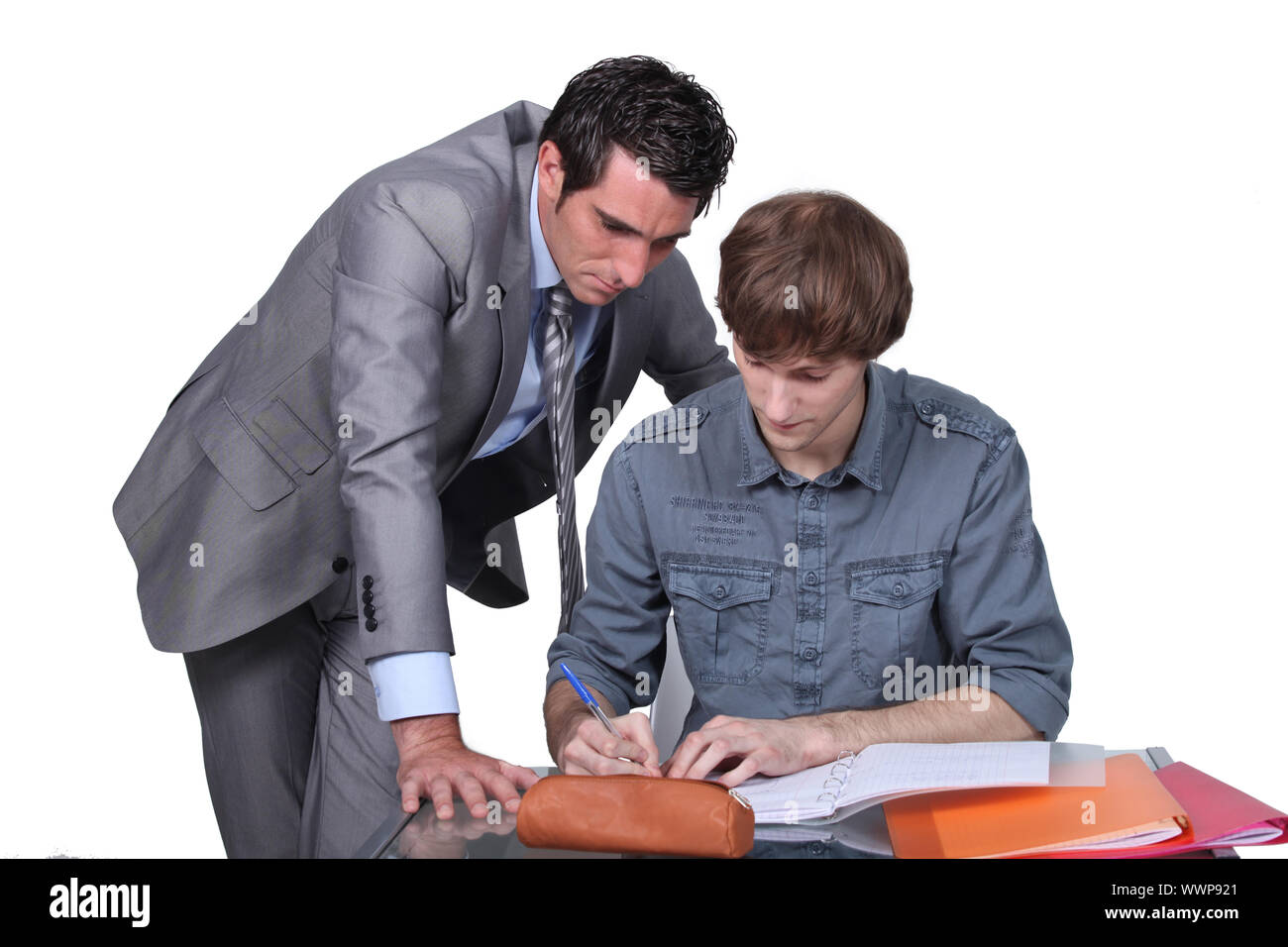 Teacher helping student one on one hi-res stock photography and images ...