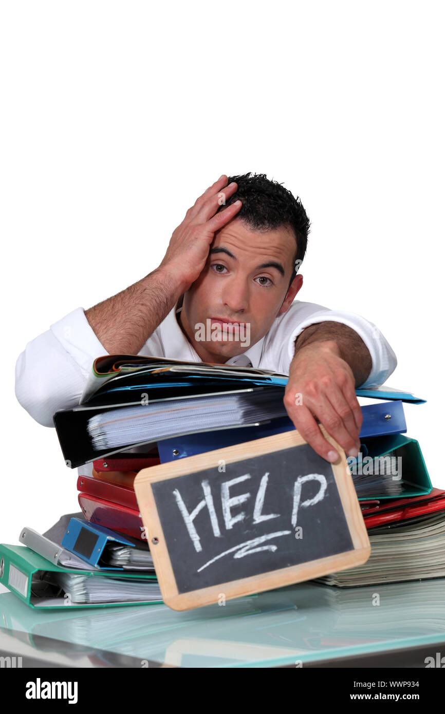 Office worker with a sign asking for help Stock Photo - Alamy