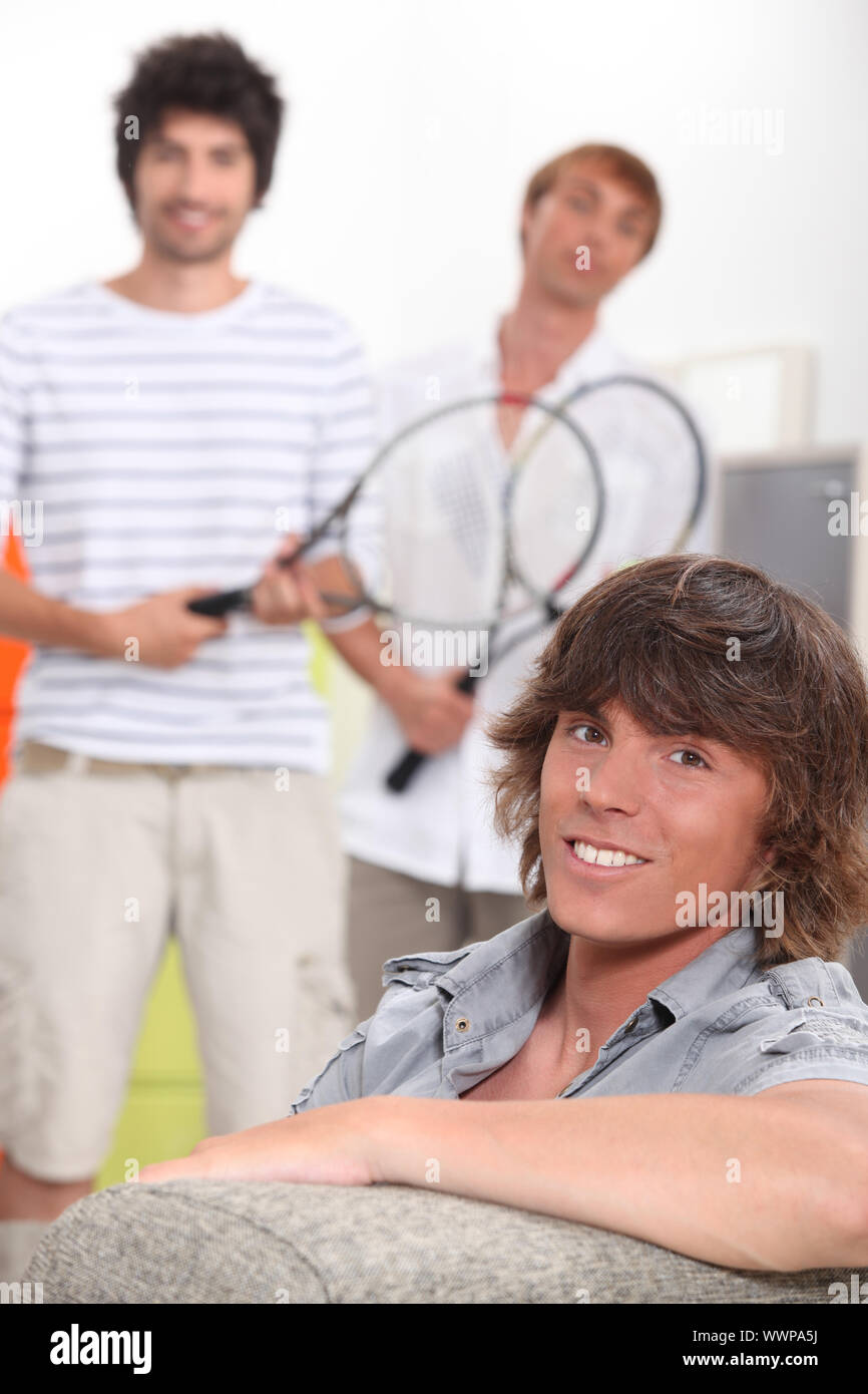 portrait of a young man with friends Stock Photo - Alamy