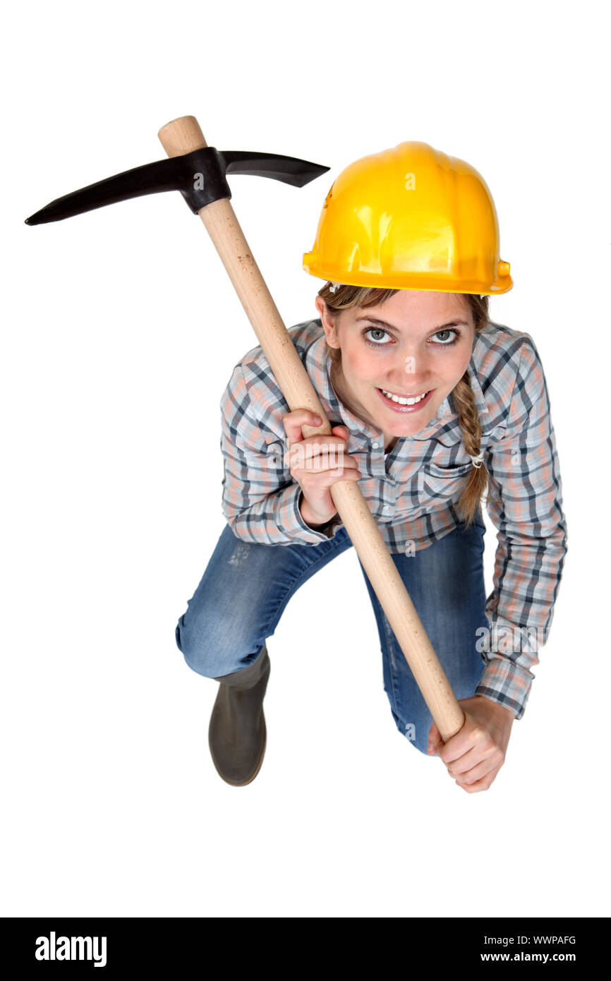 A female construction worker with a pickaxe Stock Photo - Alamy