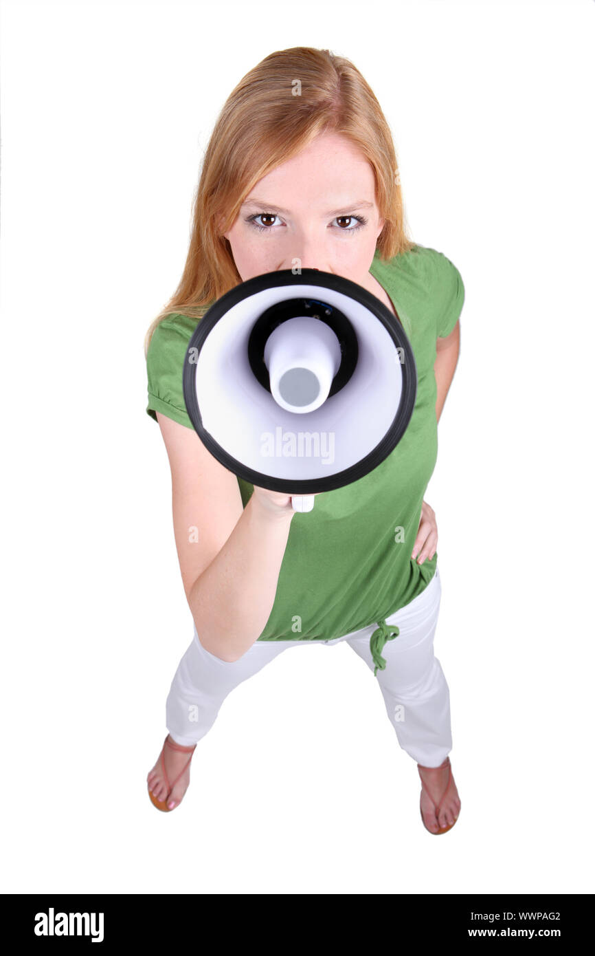 Ginger haired girl speaking into megaphone Stock Photo - Alamy