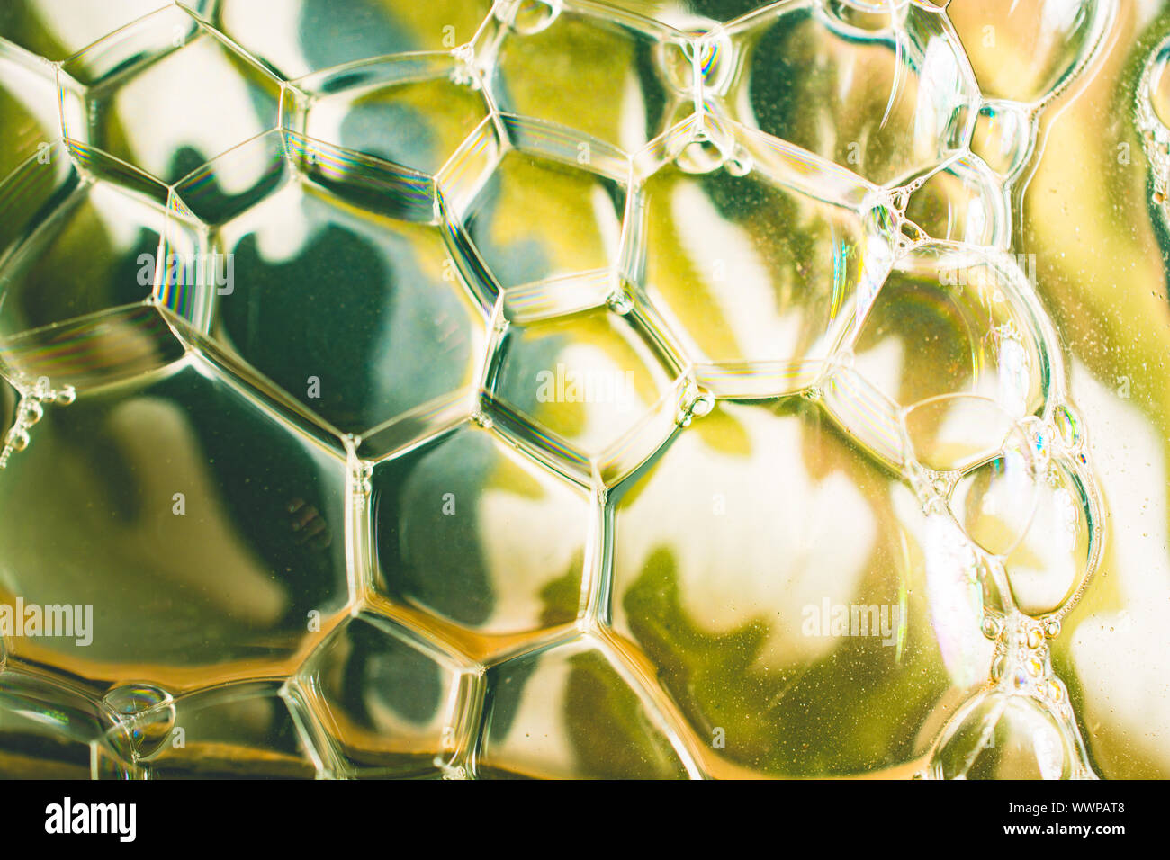 Oil bubbles inside water base form patterns Stock Photo - Alamy