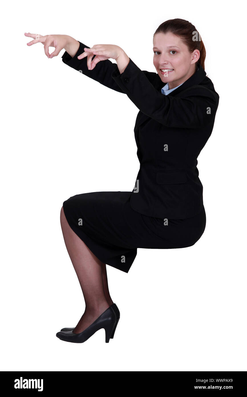 Woman pretending to be puppet master Stock Photo - Alamy