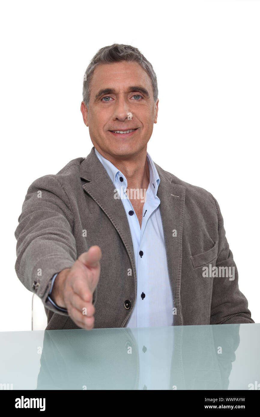 man giving his hand for a handshake Stock Photo - Alamy