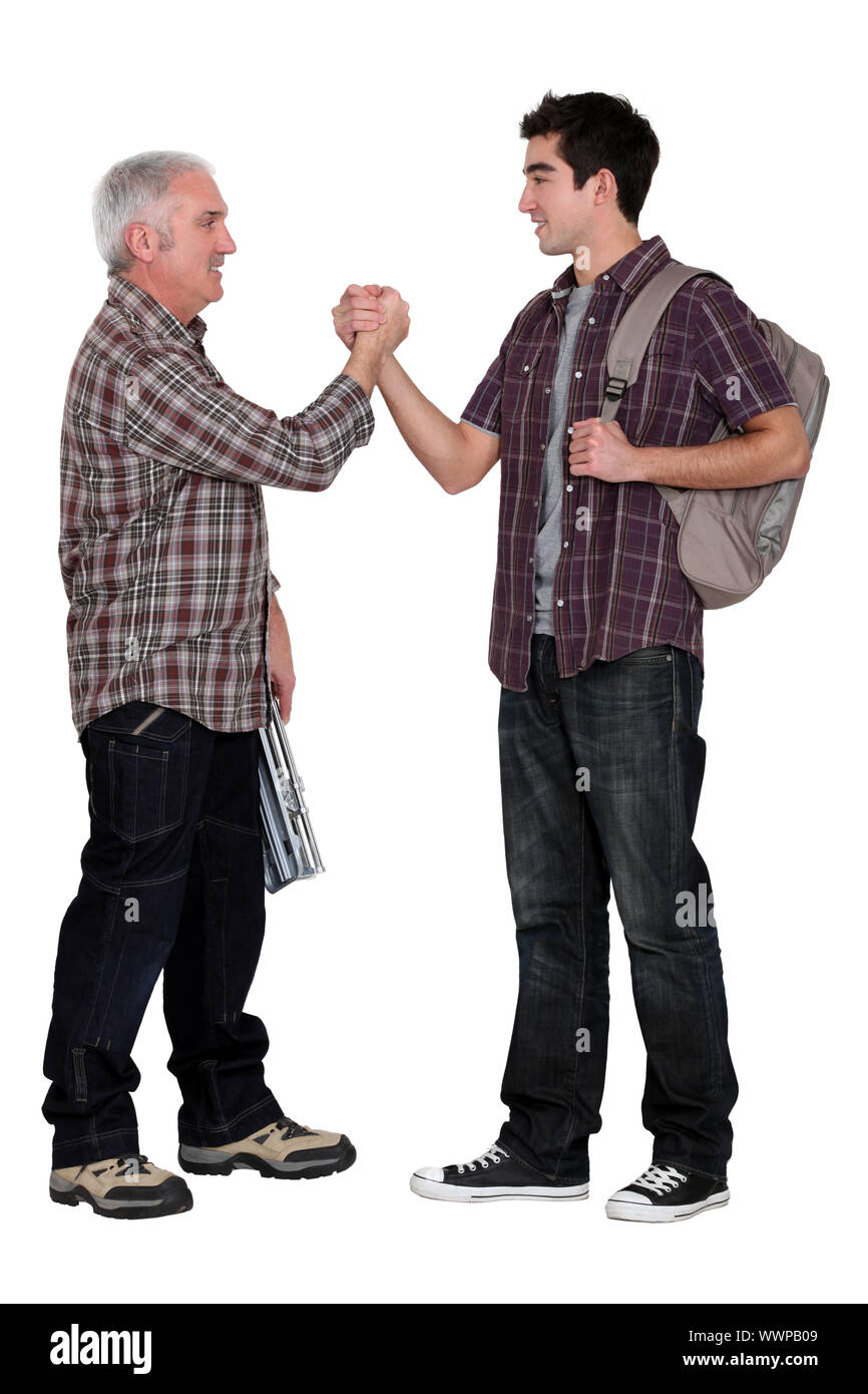 Colleagues handshaking Cut Out Stock Images & Pictures - Alamy