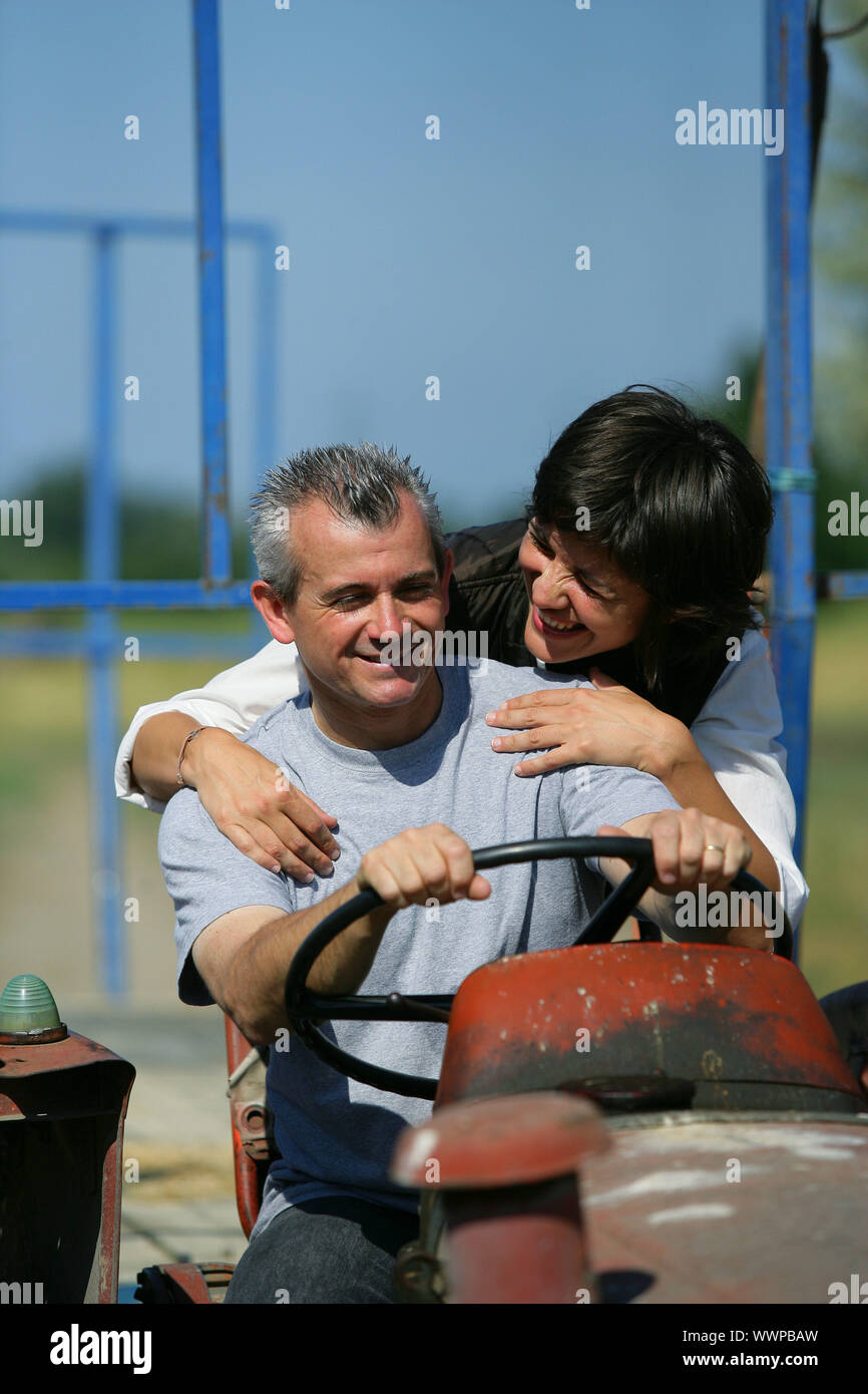 Man wife driving tractor hi-res stock photography and images - Alamy
