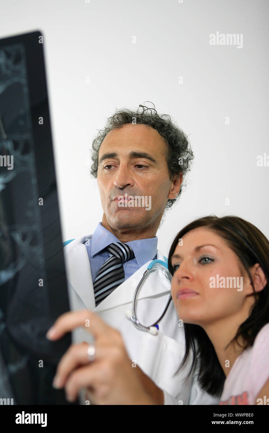 Doctor getting a second opinion Stock Photo - Alamy