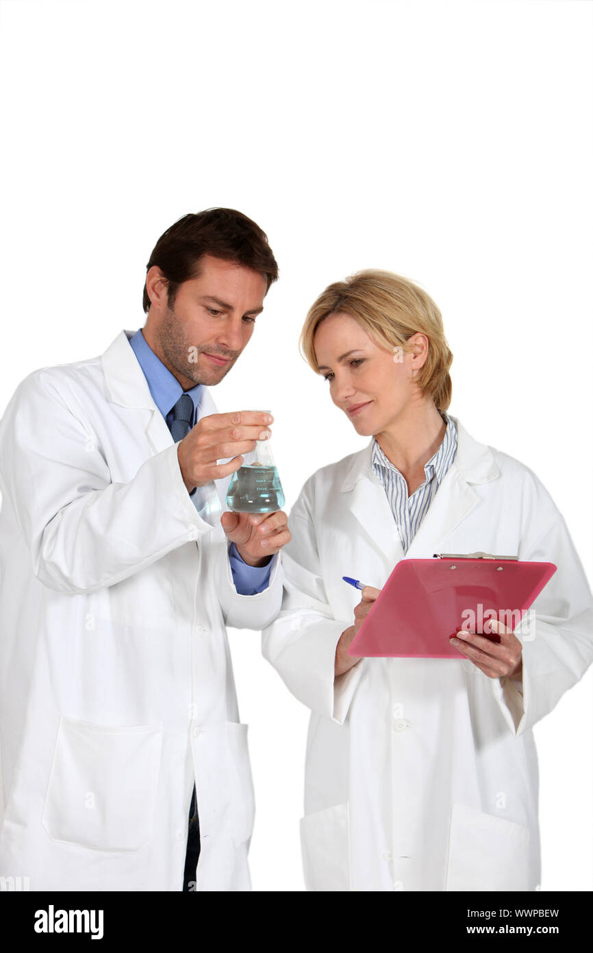 Two scientists in laboratory Stock Photo - Alamy
