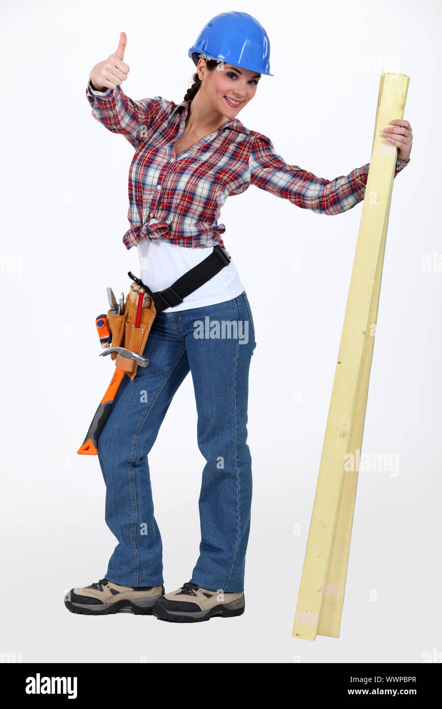 Happy woman carpenter Stock Photo - Alamy