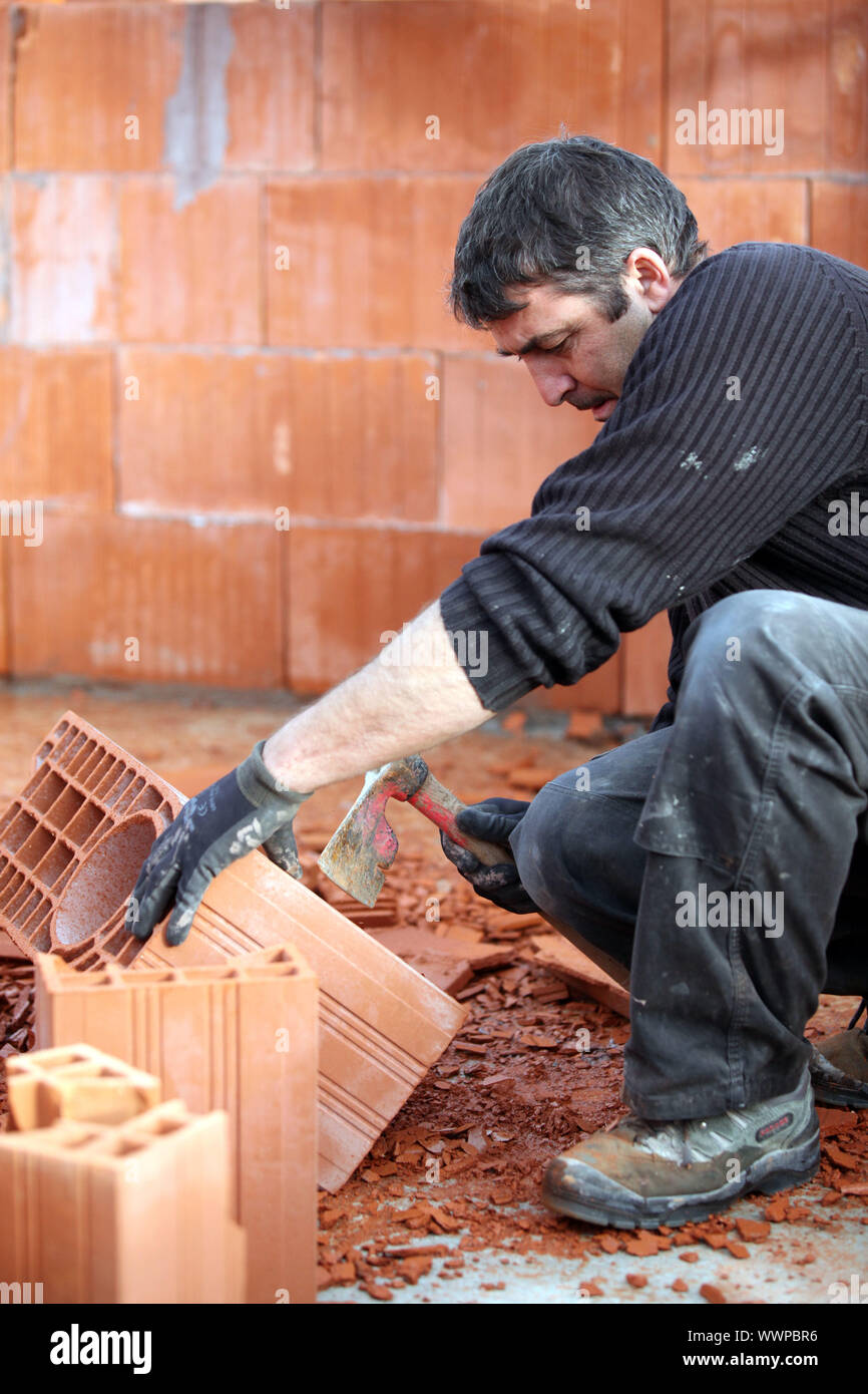 Smashing bricks hi-res stock photography and images - Alamy