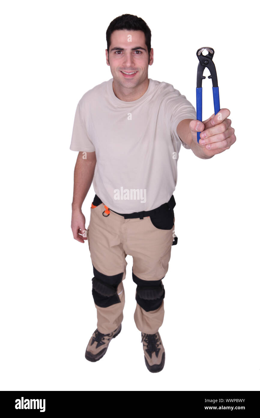 Man showing pliers Stock Photo - Alamy