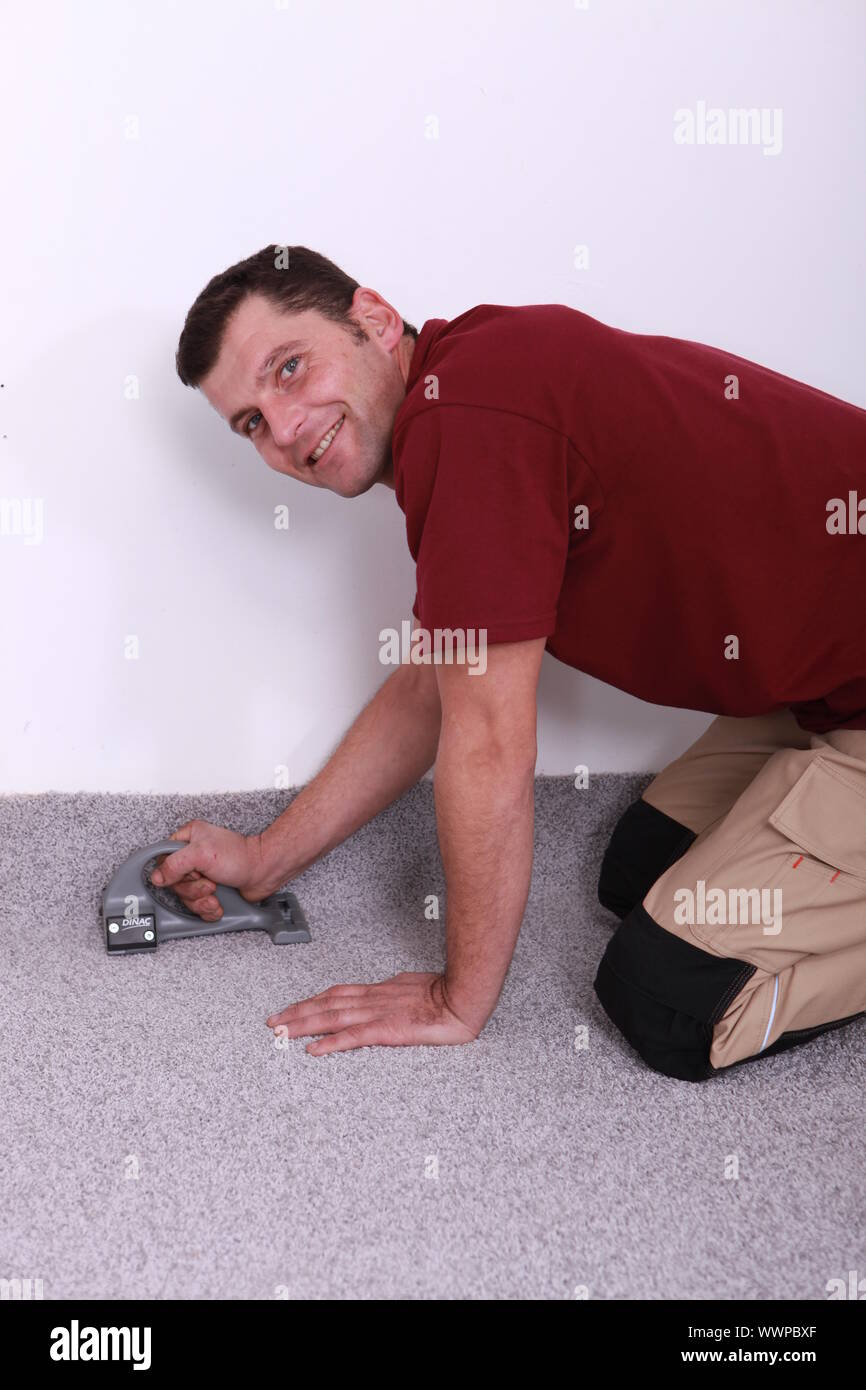 Carpet stretcher hi-res stock photography and images - Alamy