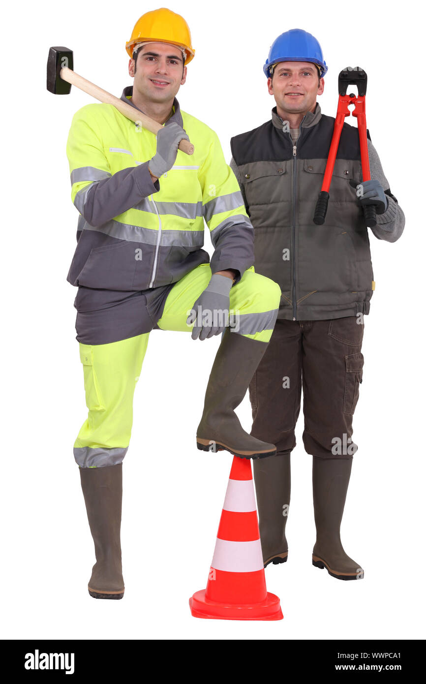 two road workers posing Stock Photo - Alamy