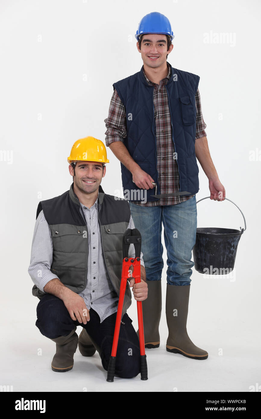 Manual workers building stone wall hi-res stock photography and images ...