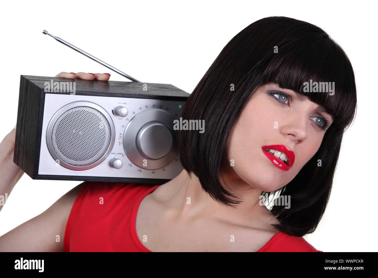 Brunette woman with a radio Stock Photo - Alamy