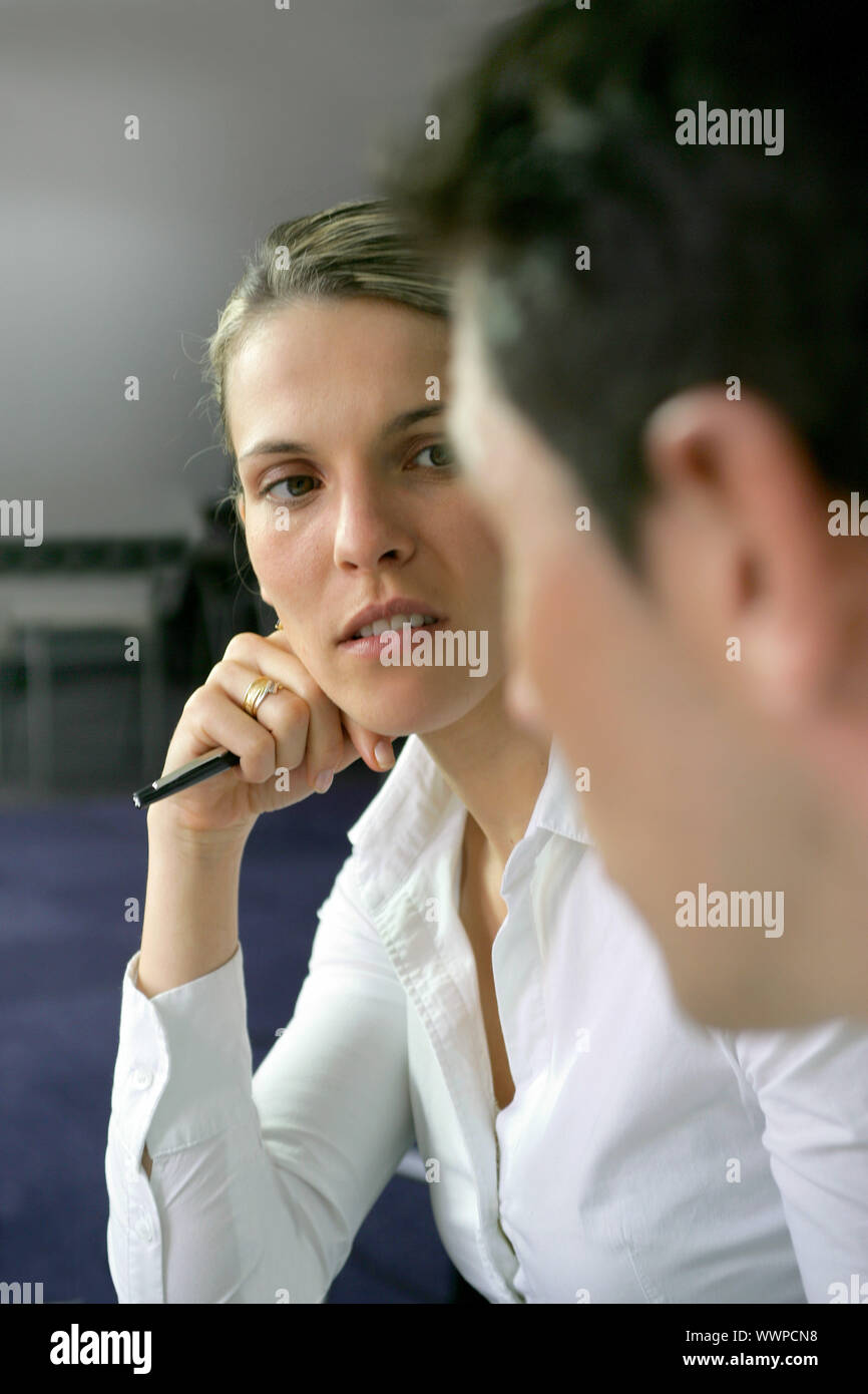 Two colleagues chatting Stock Photo - Alamy