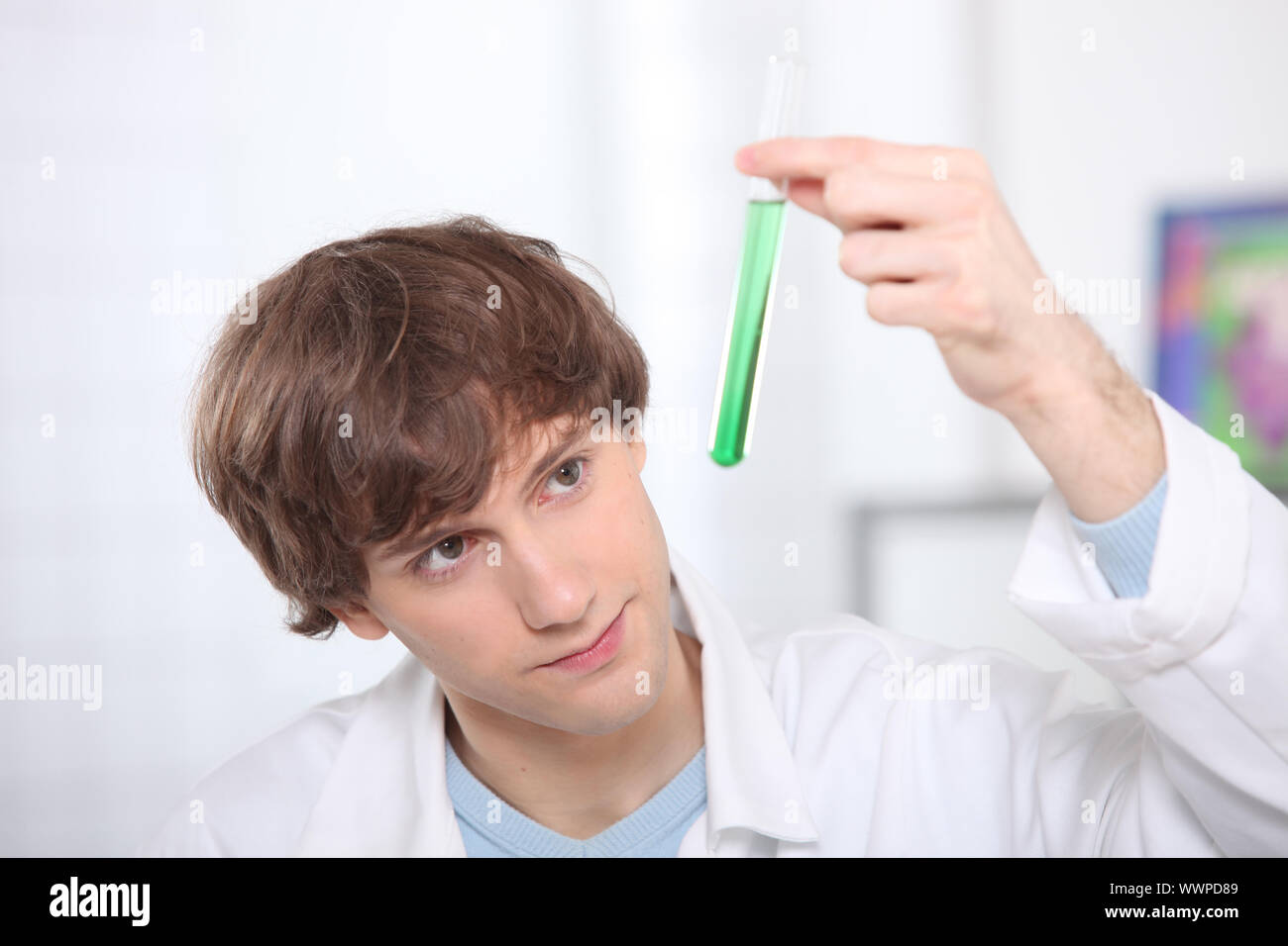 Male teenager in science laboratory Stock Photo - Alamy