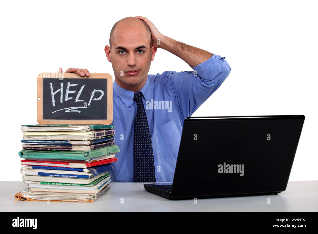 Man with a laptop asking for help Stock Photo - Alamy