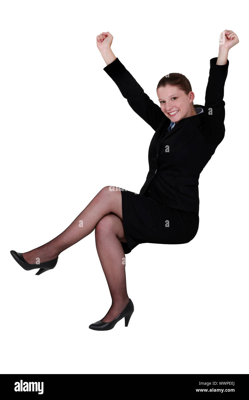 Successful woman sat down Stock Photo - Alamy