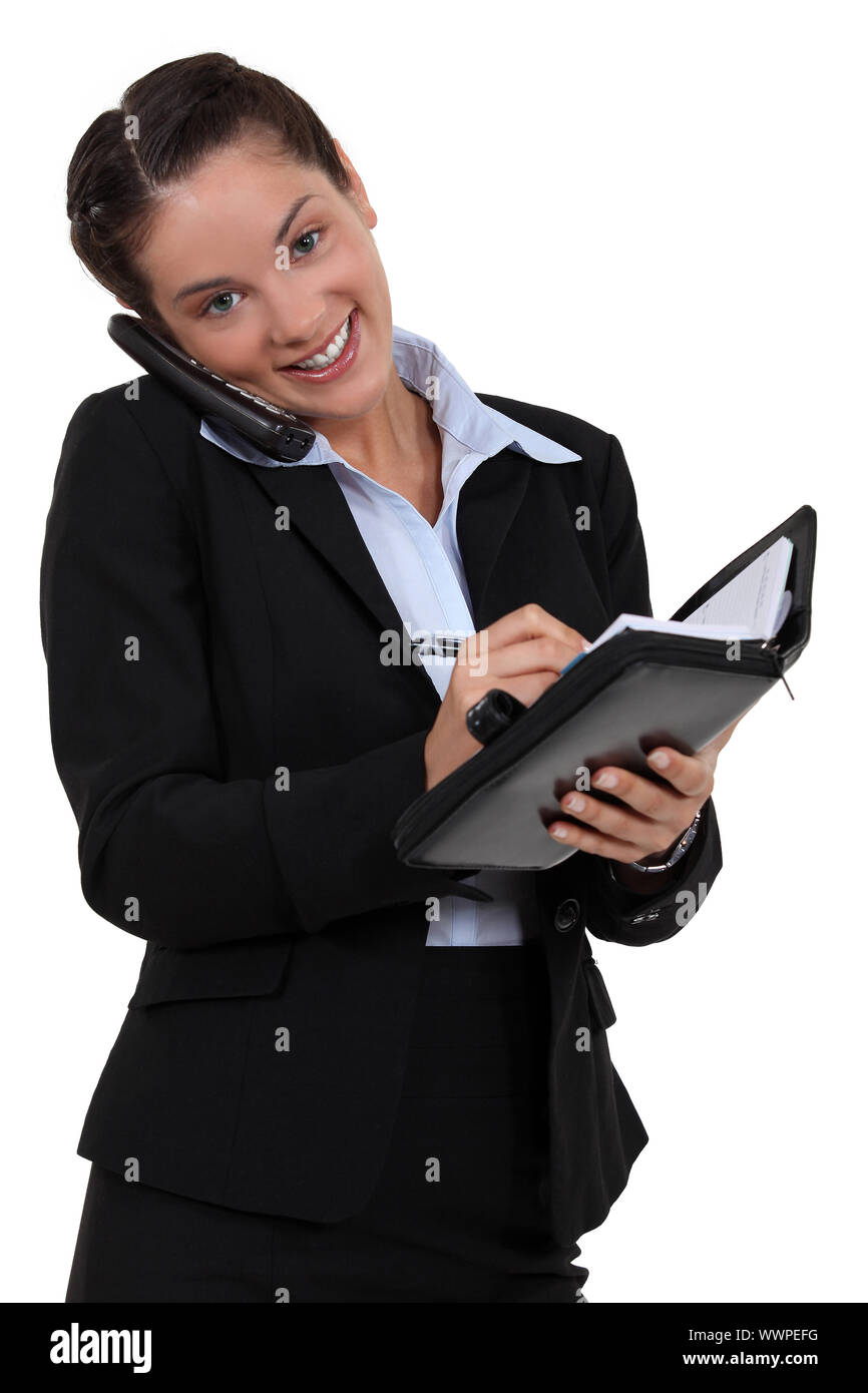 Secretary scheduling an appointment Stock Photo - Alamy
