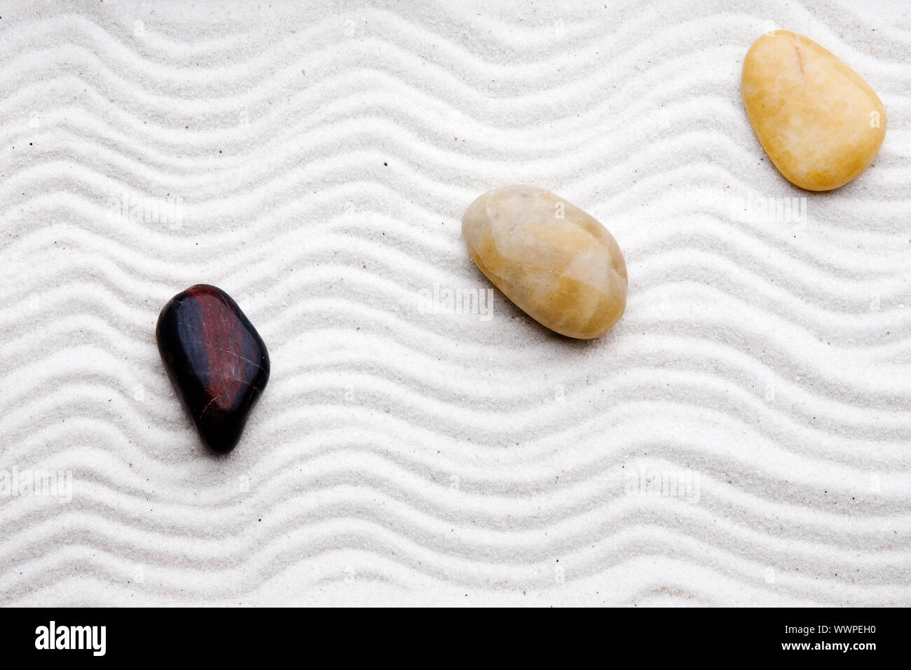 Japanese zen rock garden with white raked sand Stock Photo - Alamy