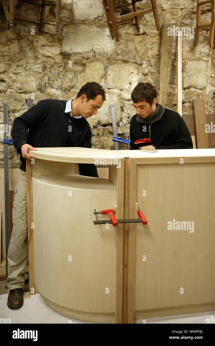 Carpenters building a bar Stock Photo - Alamy